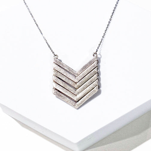 Matte Metal Silver Chevron Pendant Necklace - FENNO FASHION, LLC